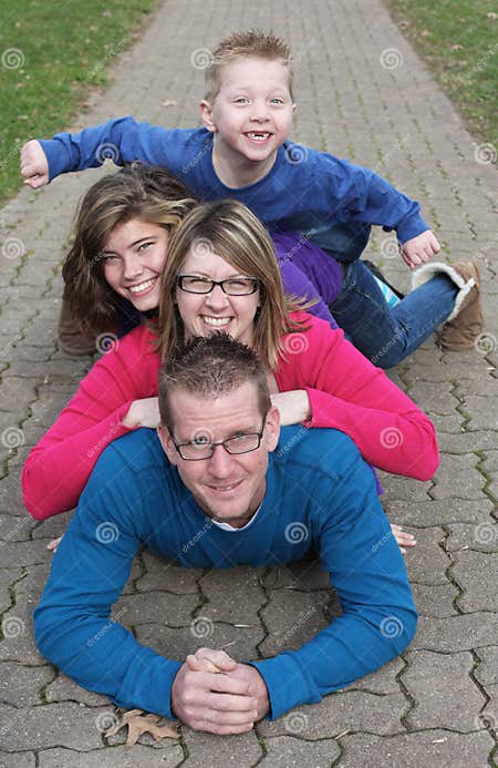 Family of Four stock image. Image of daddy, four, brother - 22336227