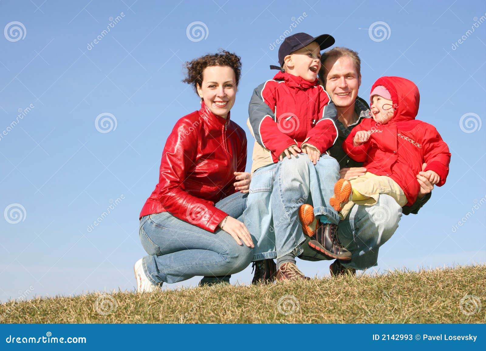 Family of four sit stock image. Image of family, four - 2142993