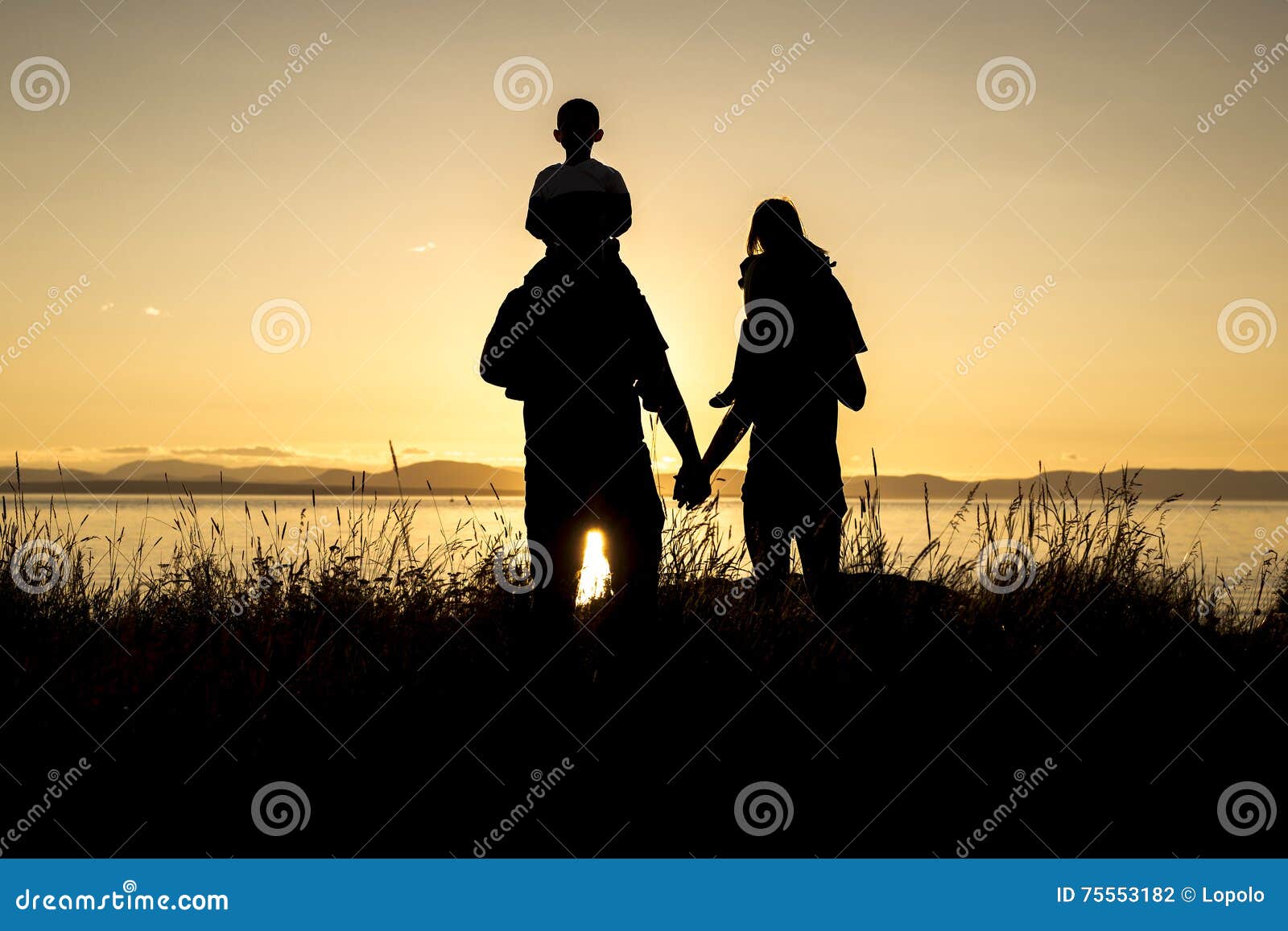 Family of Four at Sunset Shadow Black Backlit Stock Photo - Image of ...