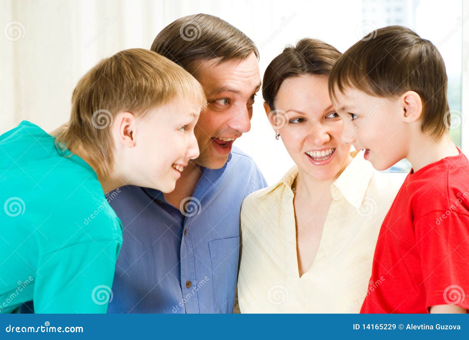Family of four talks stock image. Image of parents, isolated - 14165229