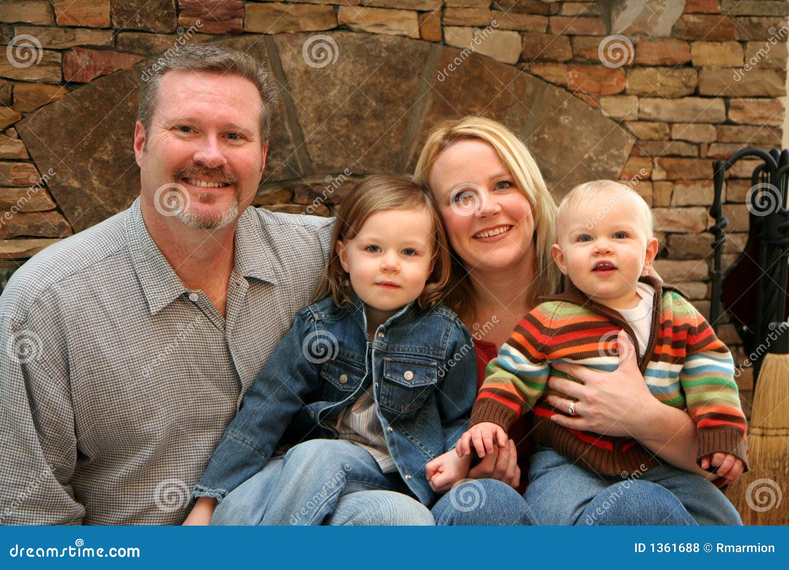 Family in Front of Fireplace Stock Photo - Image of children, hard: 1361688