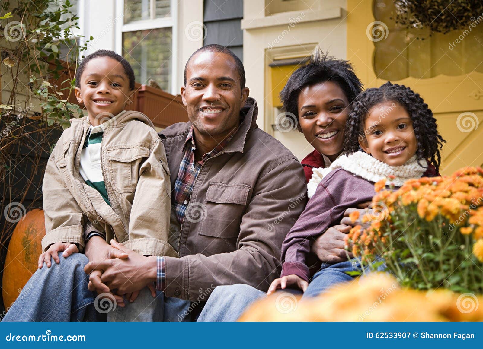 Family in front of house stock image. Image of happiness - 62533907