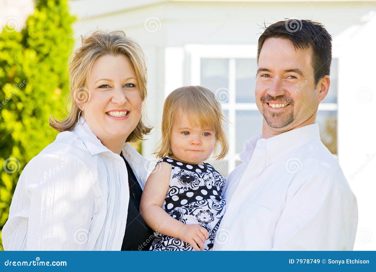 Family in Front of House stock image. Image of caucasian - 7978749
