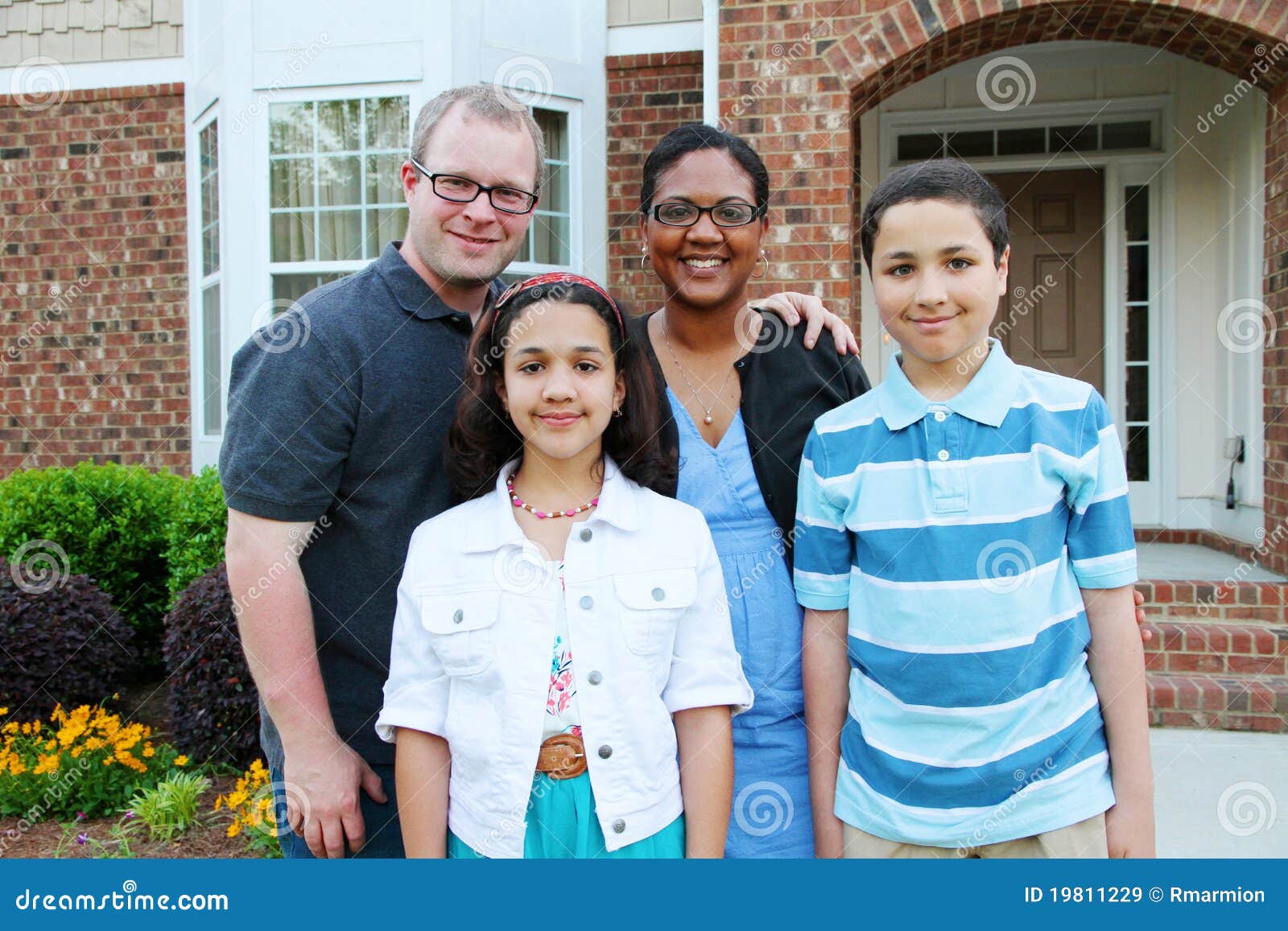 Family in Front of Their House Stock Image - Image of interracial ...