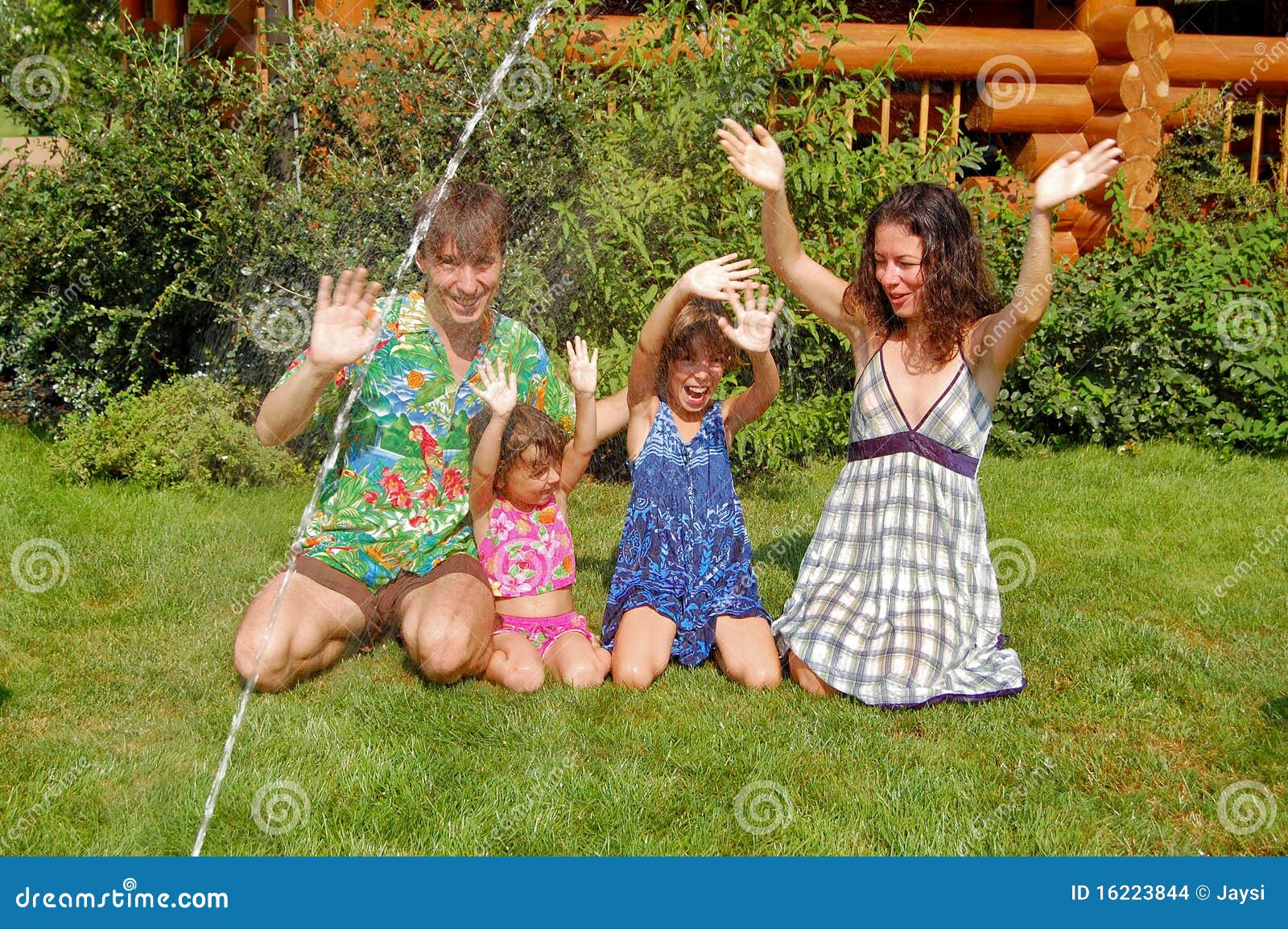 Family fun in the garden stock photo. Image of people - 16223844