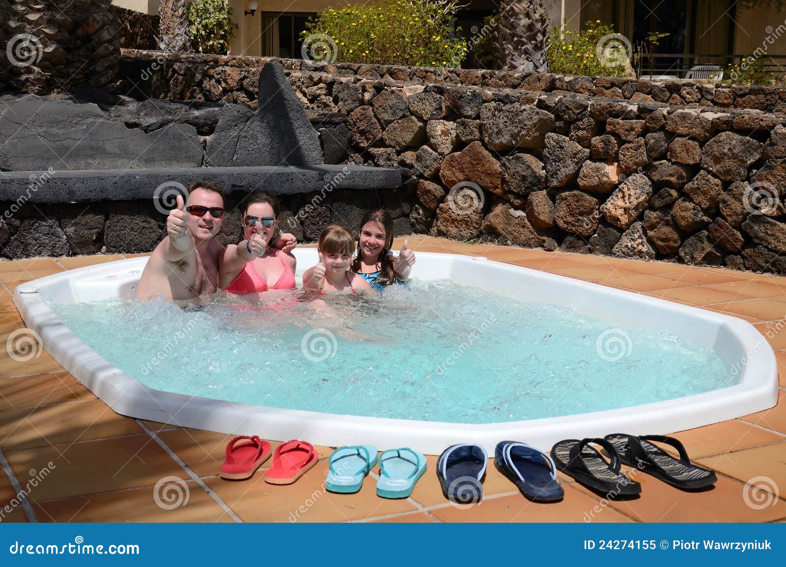 Family fun with jacuzzi stock image. Image of health - 24274155