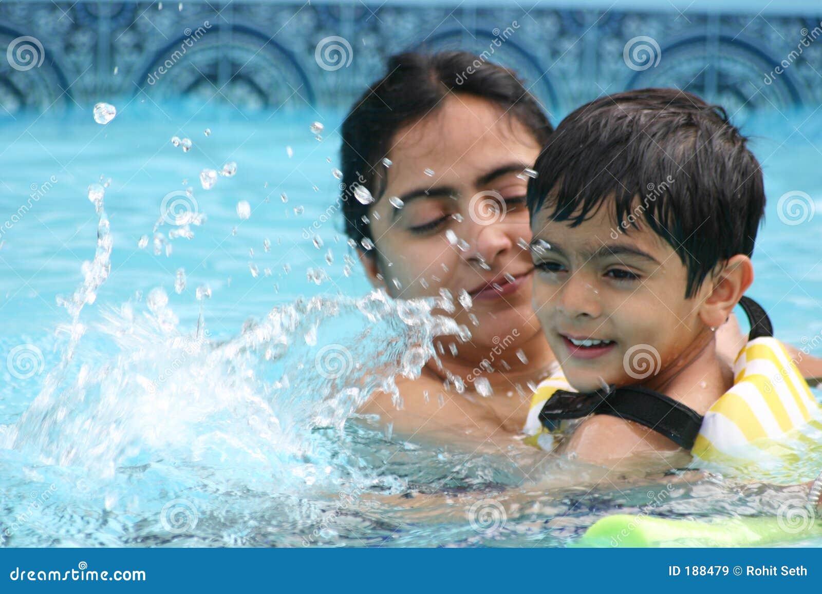Family fun in the pool stock image. Image of parent, love - 188479