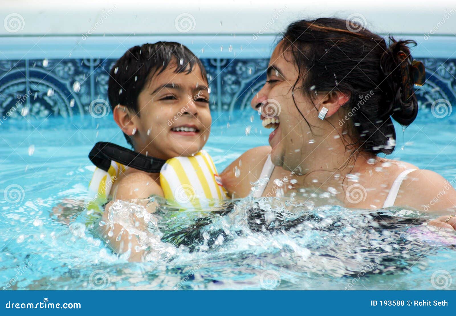 Family fun at the pool stock photo. Image of heat, splash - 193588