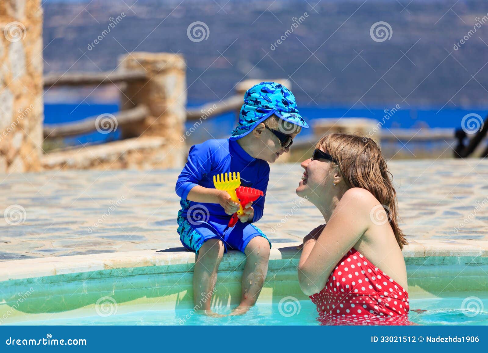 Family fun at the pool stock photo. Image of mother, baby - 33021512