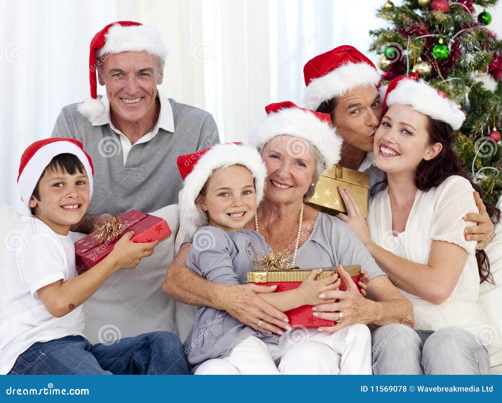 Family Giving Presents for Christmas Stock Photo - Image of male ...