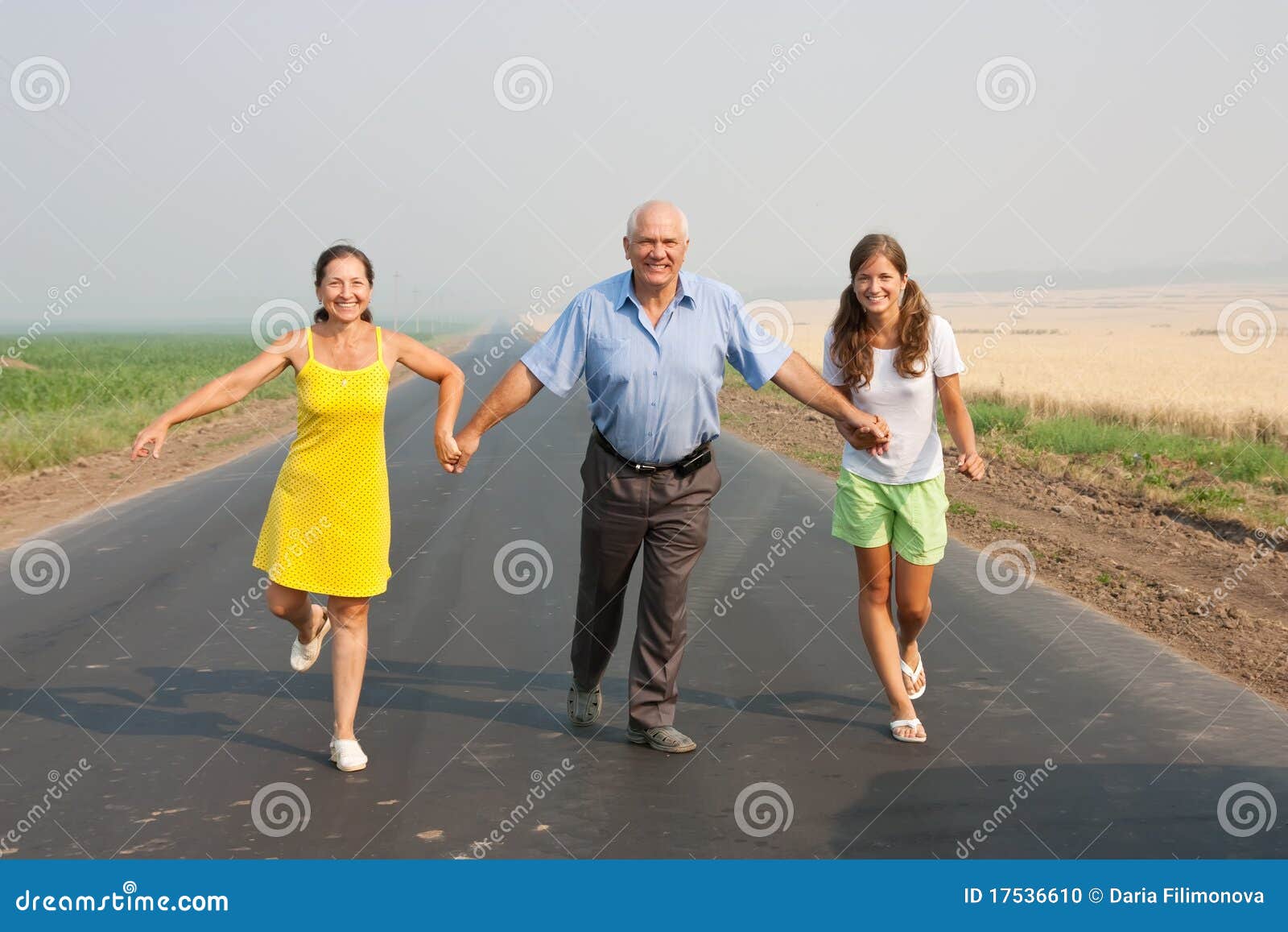Family Go for a Walk Over a Road Stock Photo - Image of child, runing ...