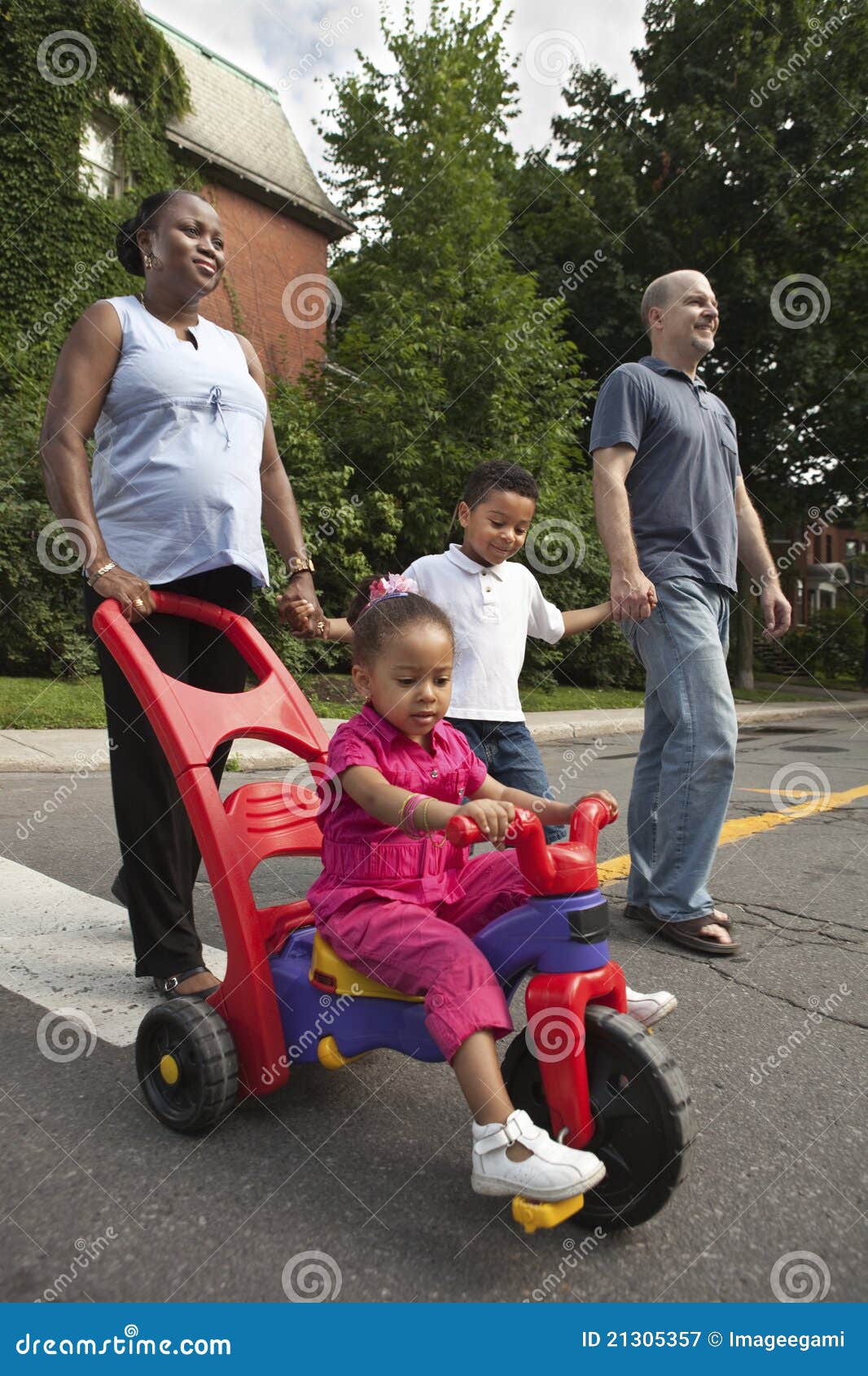 Family going for a walk stock image. Image of american - 21305357