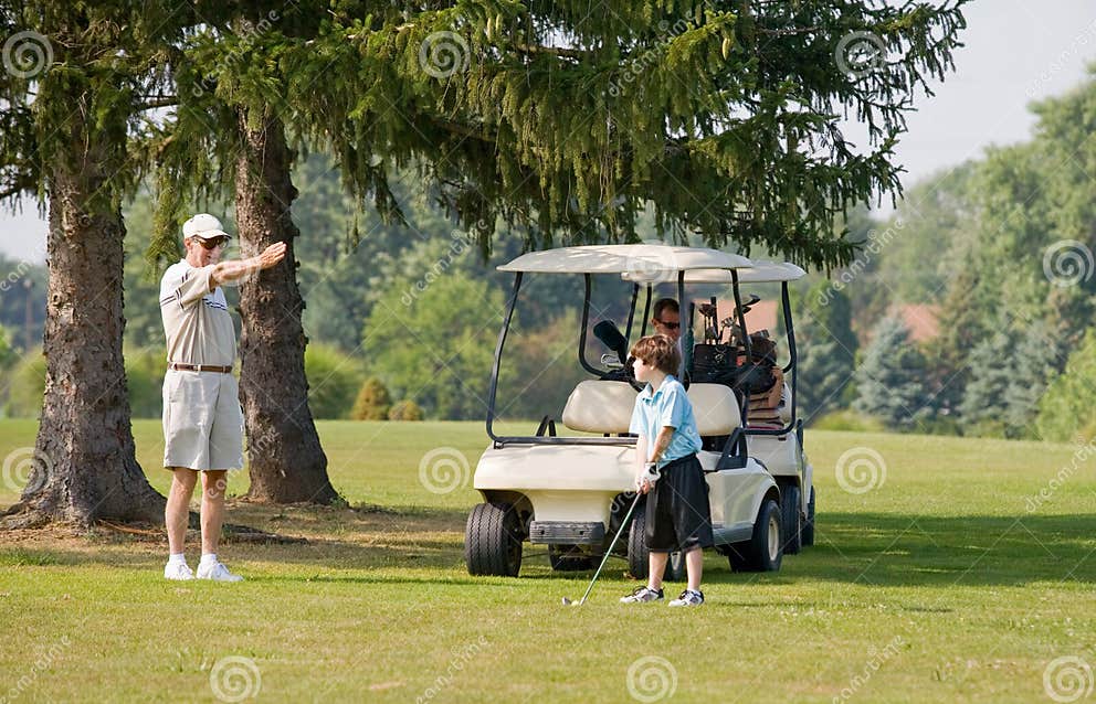 Family golfing stock image. Image of instructing, chipping - 6291493