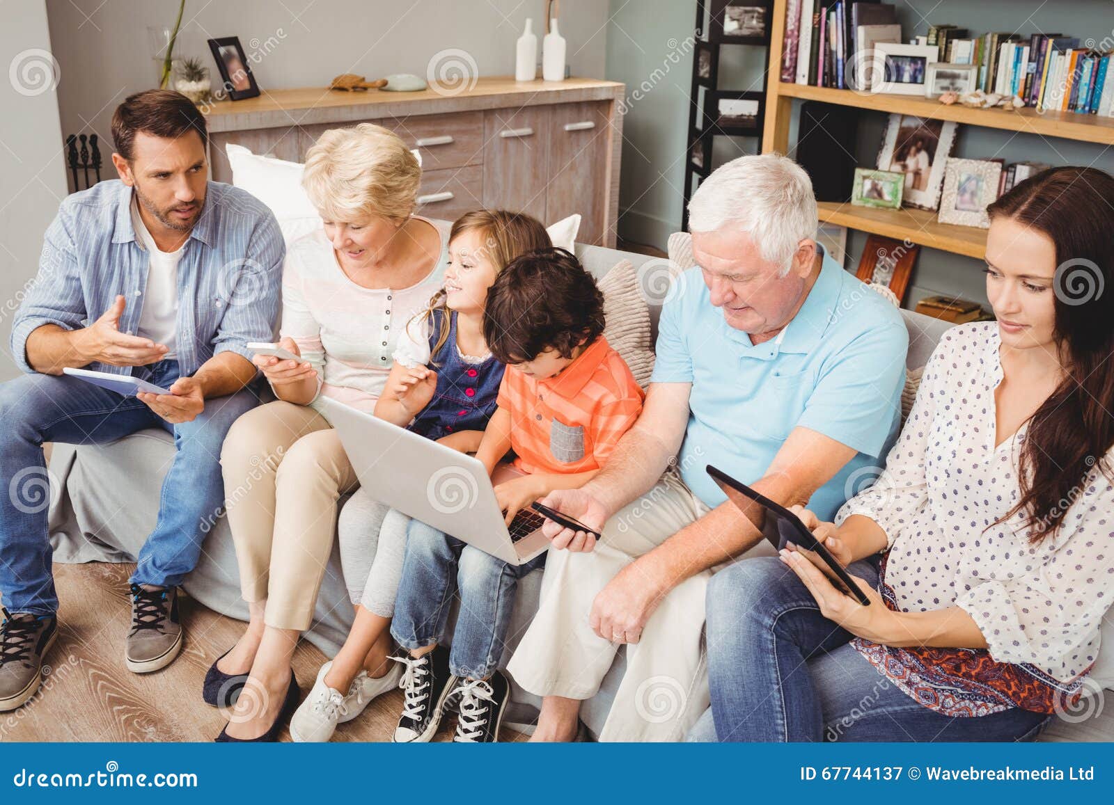 Family with Grandparents Using Technology Stock Image - Image of ...