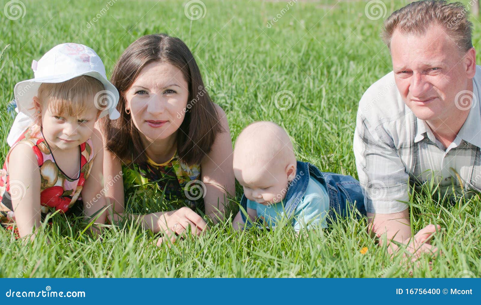 Family of the grass stock photo. Image of leisure, father - 16756400