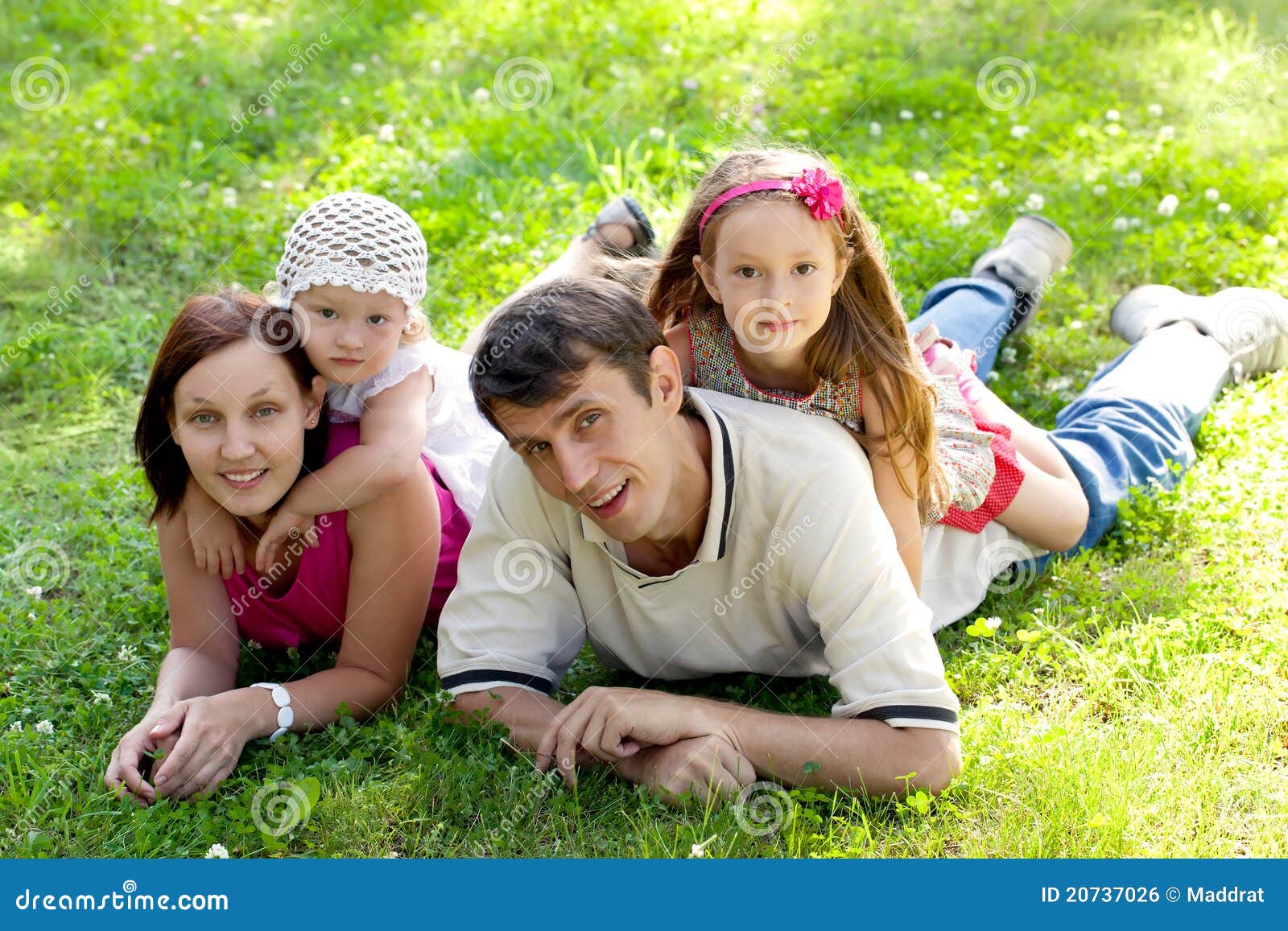 Family on grass stock photo. Image of landscape, smile - 20737026