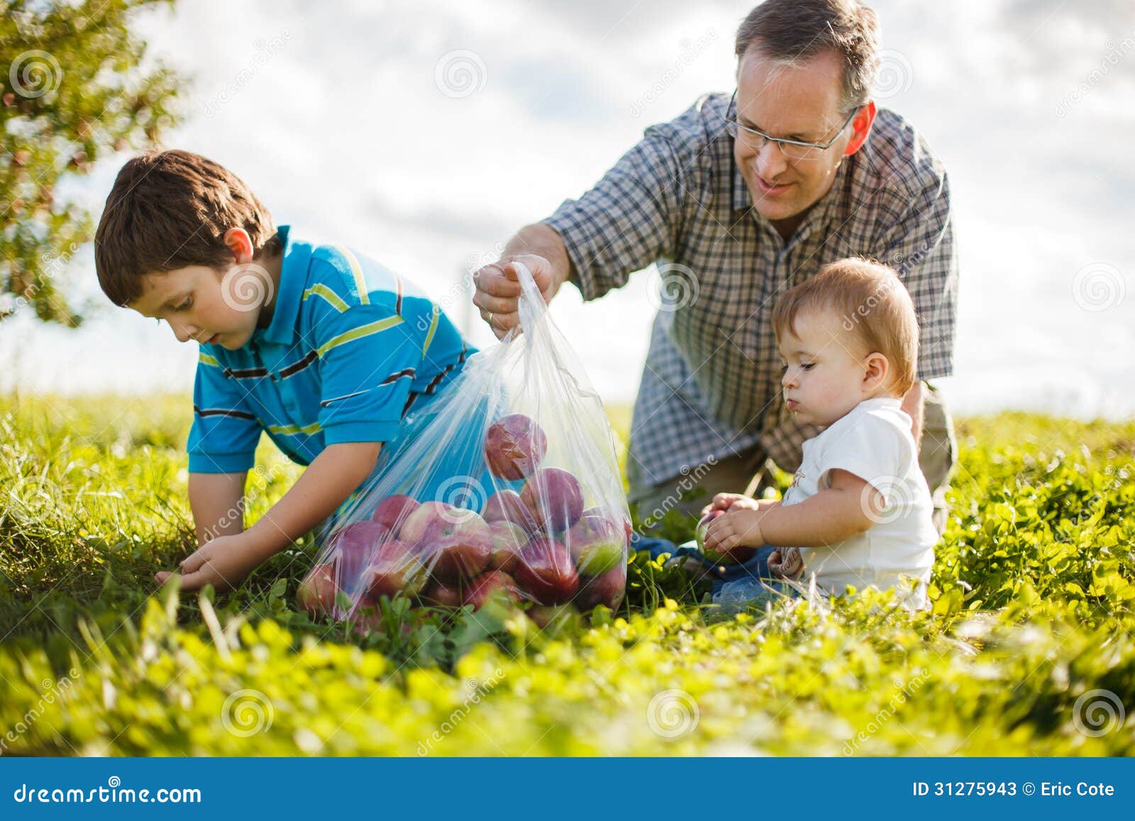 Family on the grass stock image. Image of grass, infant - 31275943