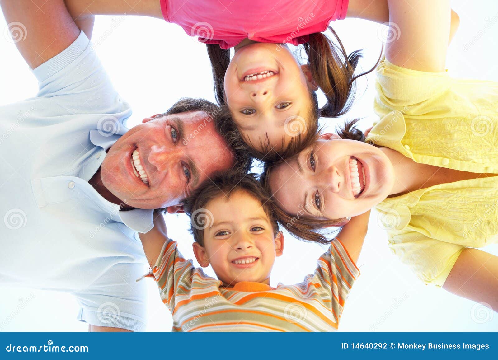 Family Group Looking Down into Camera Stock Photo - Image of laughter ...
