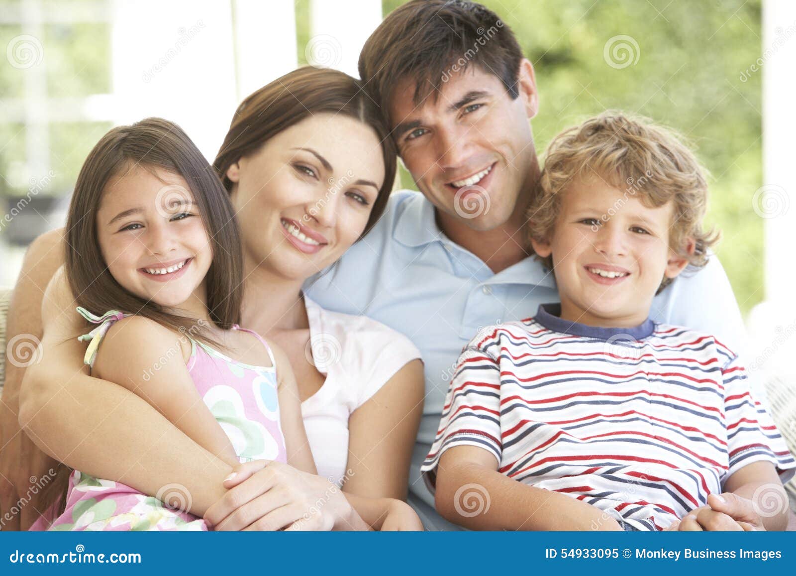 Family Group Relaxing on Chair Together Stock Image - Image of father ...