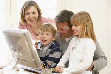 Family Group Using Computer Together Stock Photo - Image of sister ...