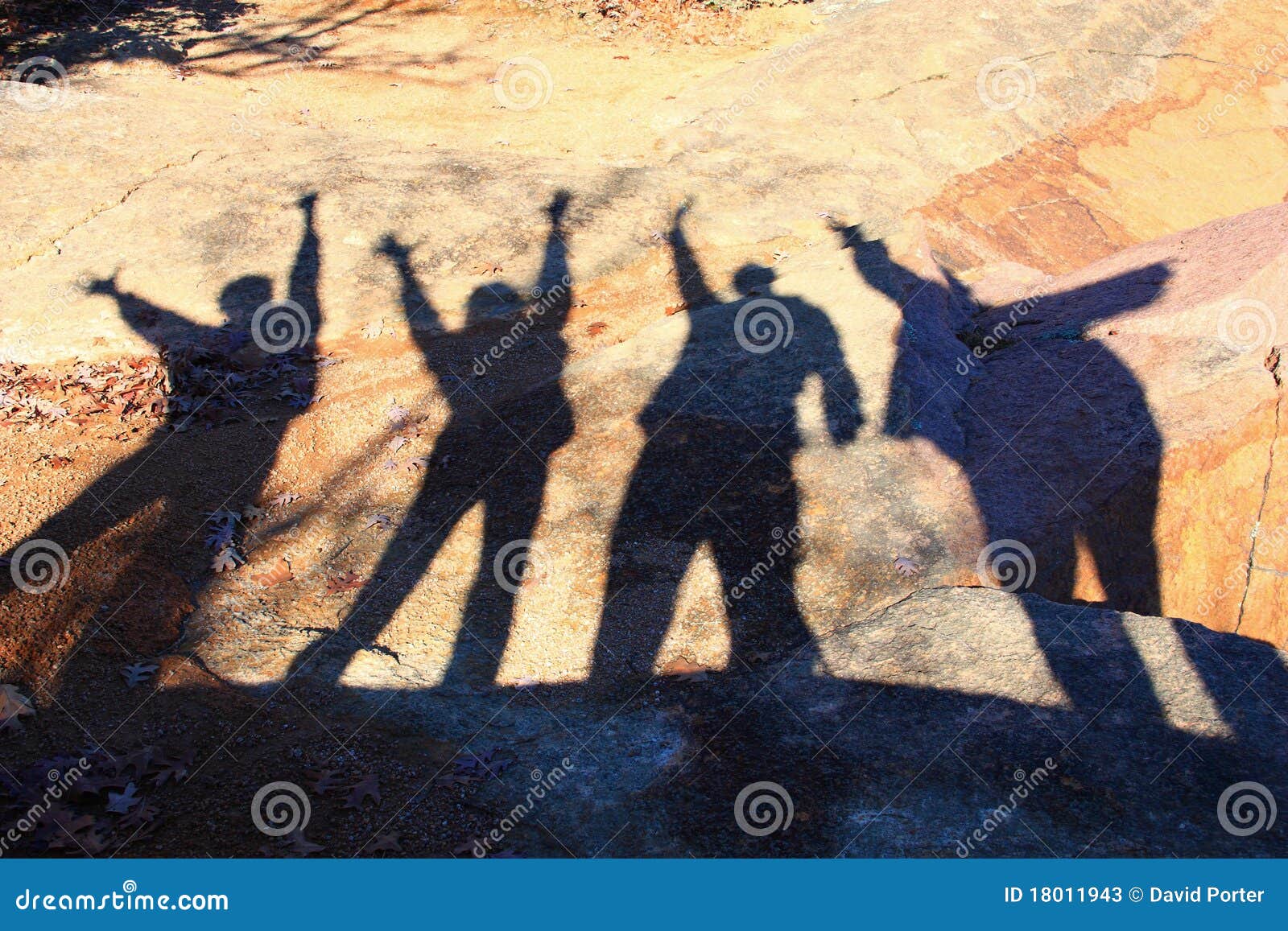 A Family of Happy Shadows stock image. Image of rocks - 18011943