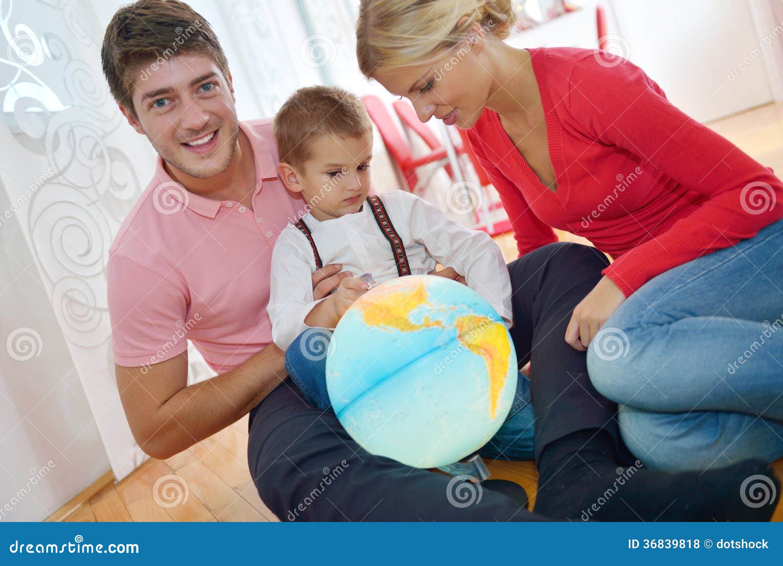 Family have fun with globe stock photo. Image of family - 36839818