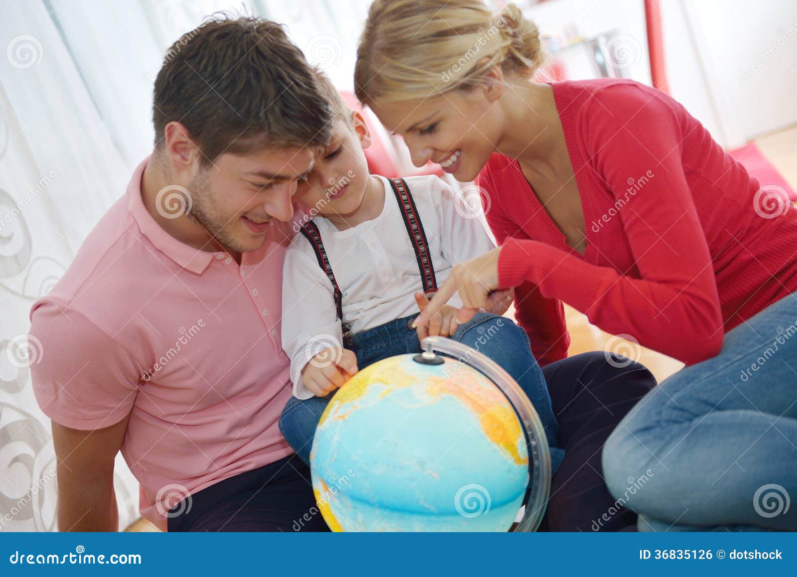 Family have fun with globe stock photo. Image of geography - 36835126