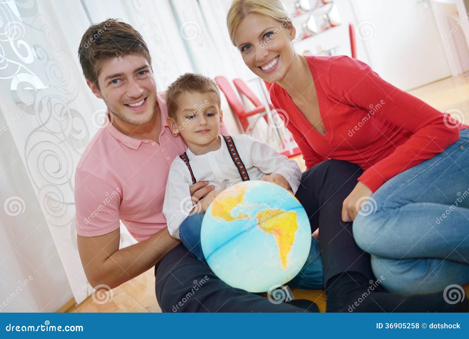 Family have fun with globe stock photo. Image of couple - 36905258