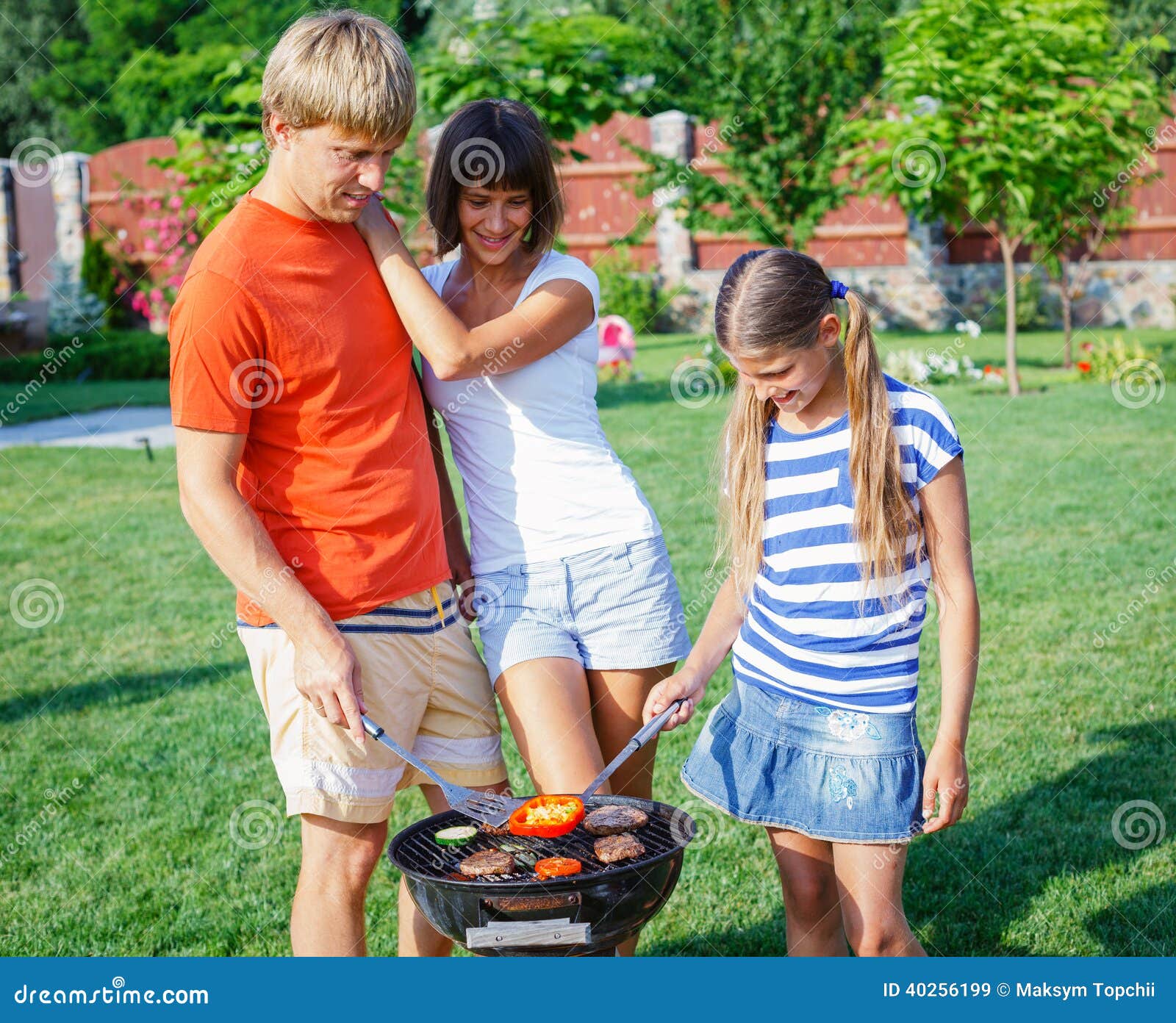 Family having barbecue stock image. Image of grilling - 40256199