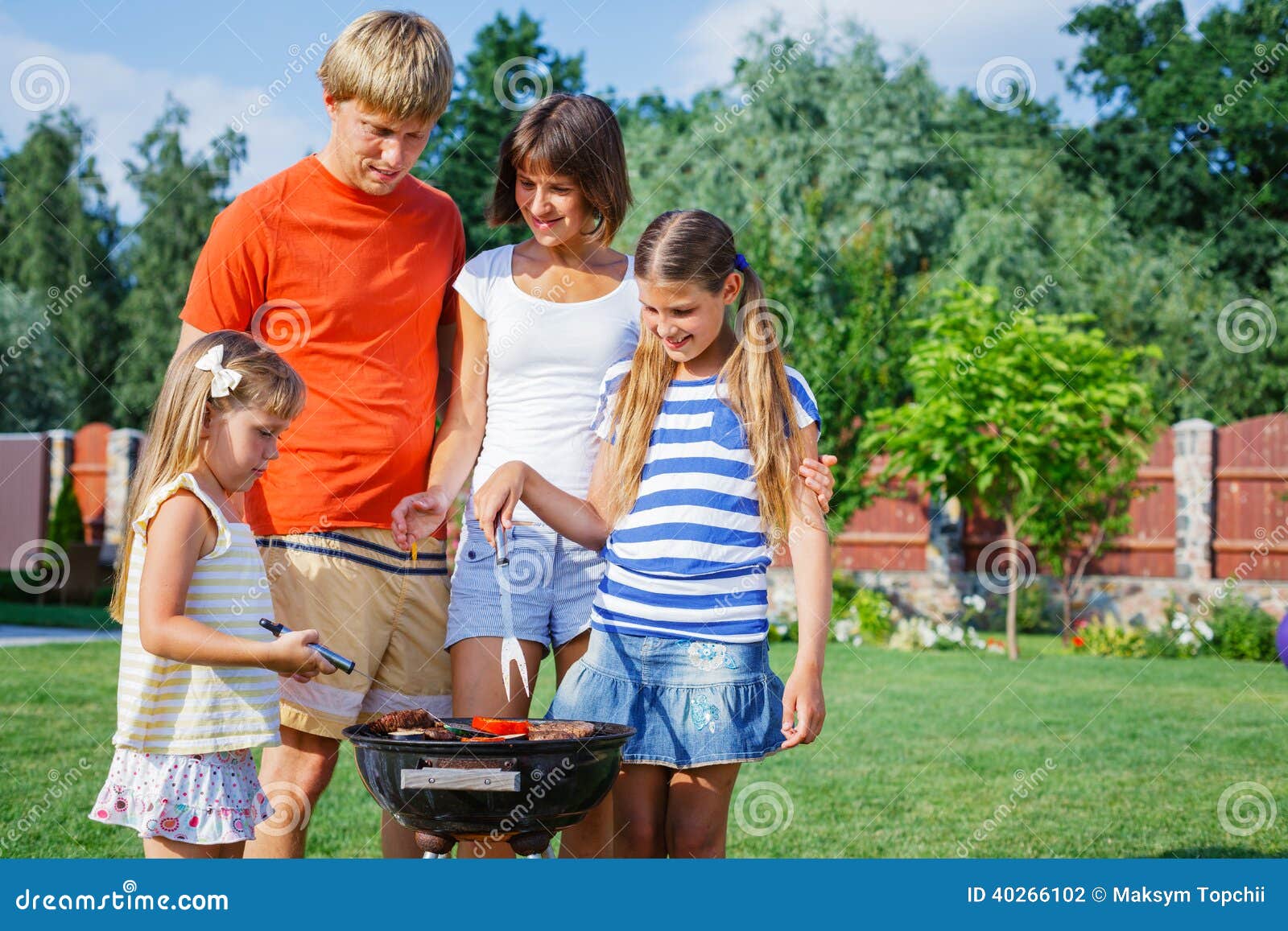 Family having barbecue stock photo. Image of burgers - 40266102