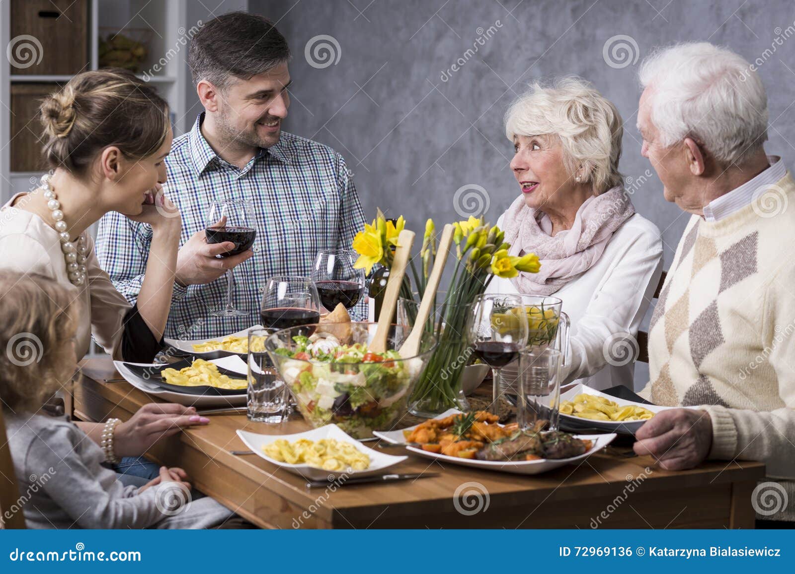 Family Having Dinner Together Stock Photo - Image of drink, lifestyle ...