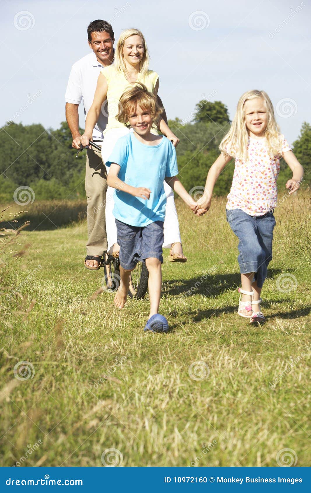 Family Having Fun in Countryside Stock Photo - Image of outdoors ...