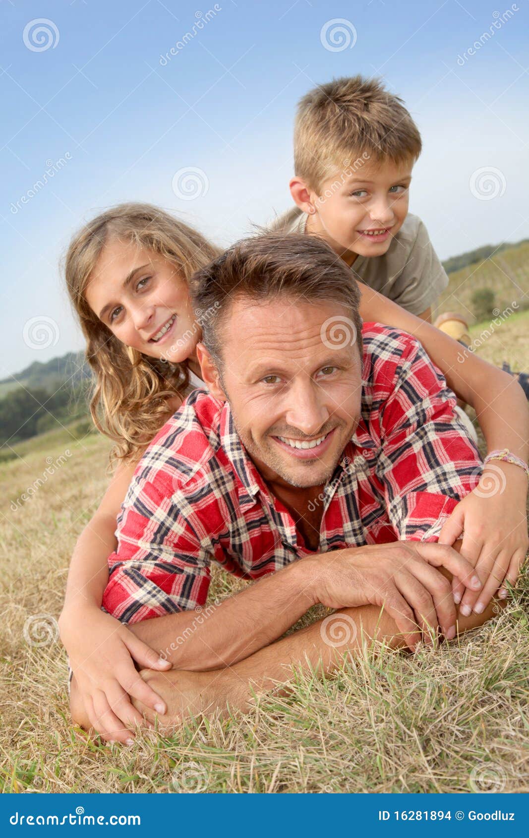 Family Having Fun in Countryside Stock Photo - Image of blond, group ...