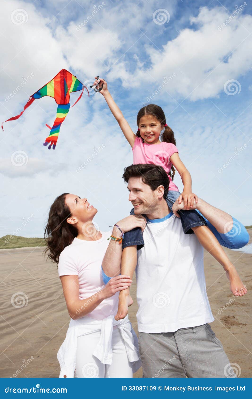 Family Having Fun Flying Kite on Beach Holiday Stock Image - Image of ...