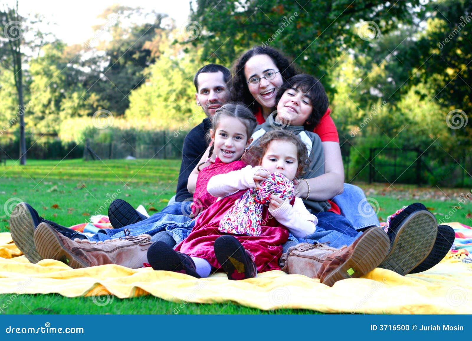 Family Having Fun in the Park. Stock Photo - Image of curious ...