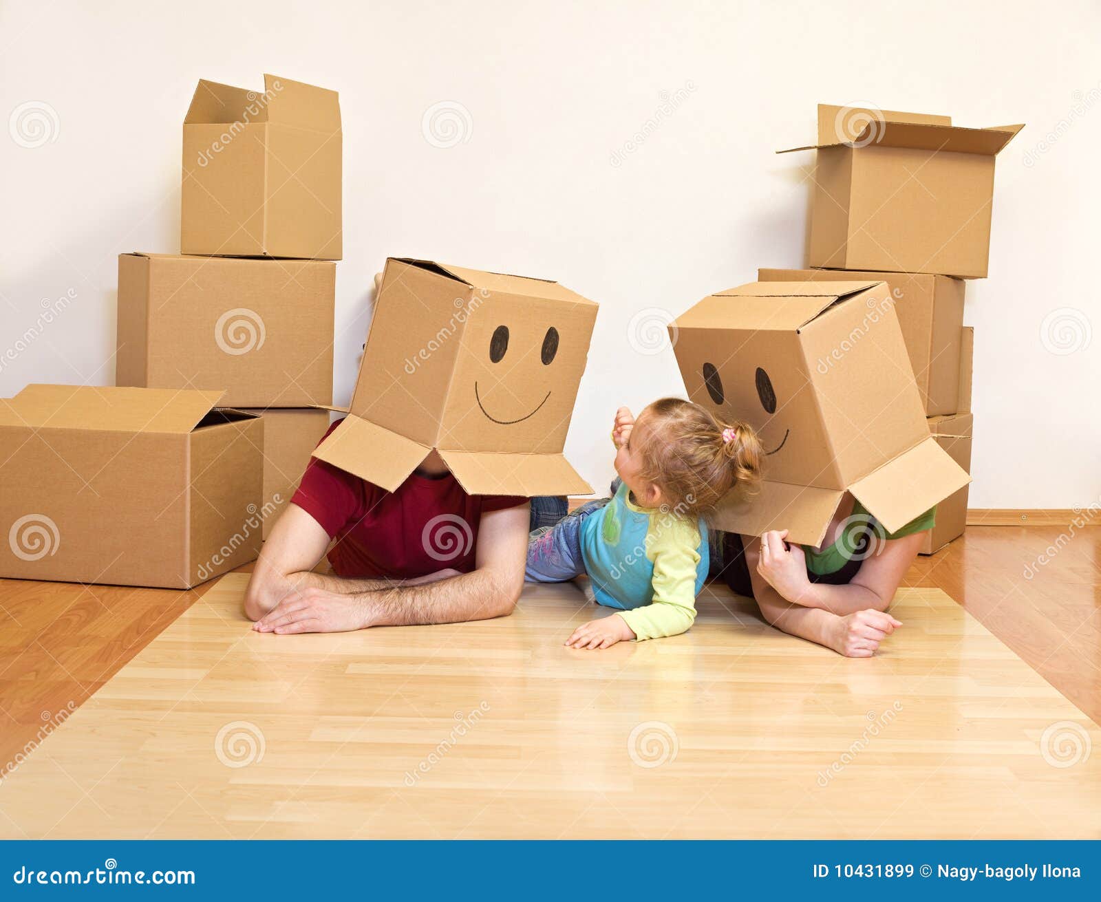 Family Having Fun Unpacking in Their New Home Stock Image - Image of ...