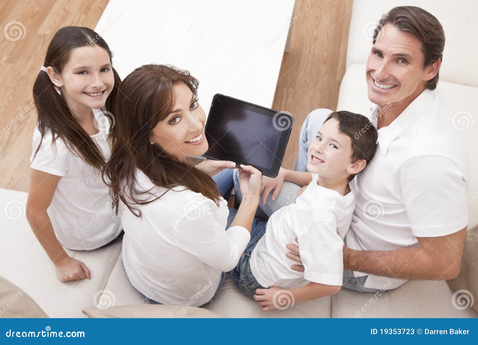 Family Having Fun Using Tablet Computer at Home Stock Image - Image of ...
