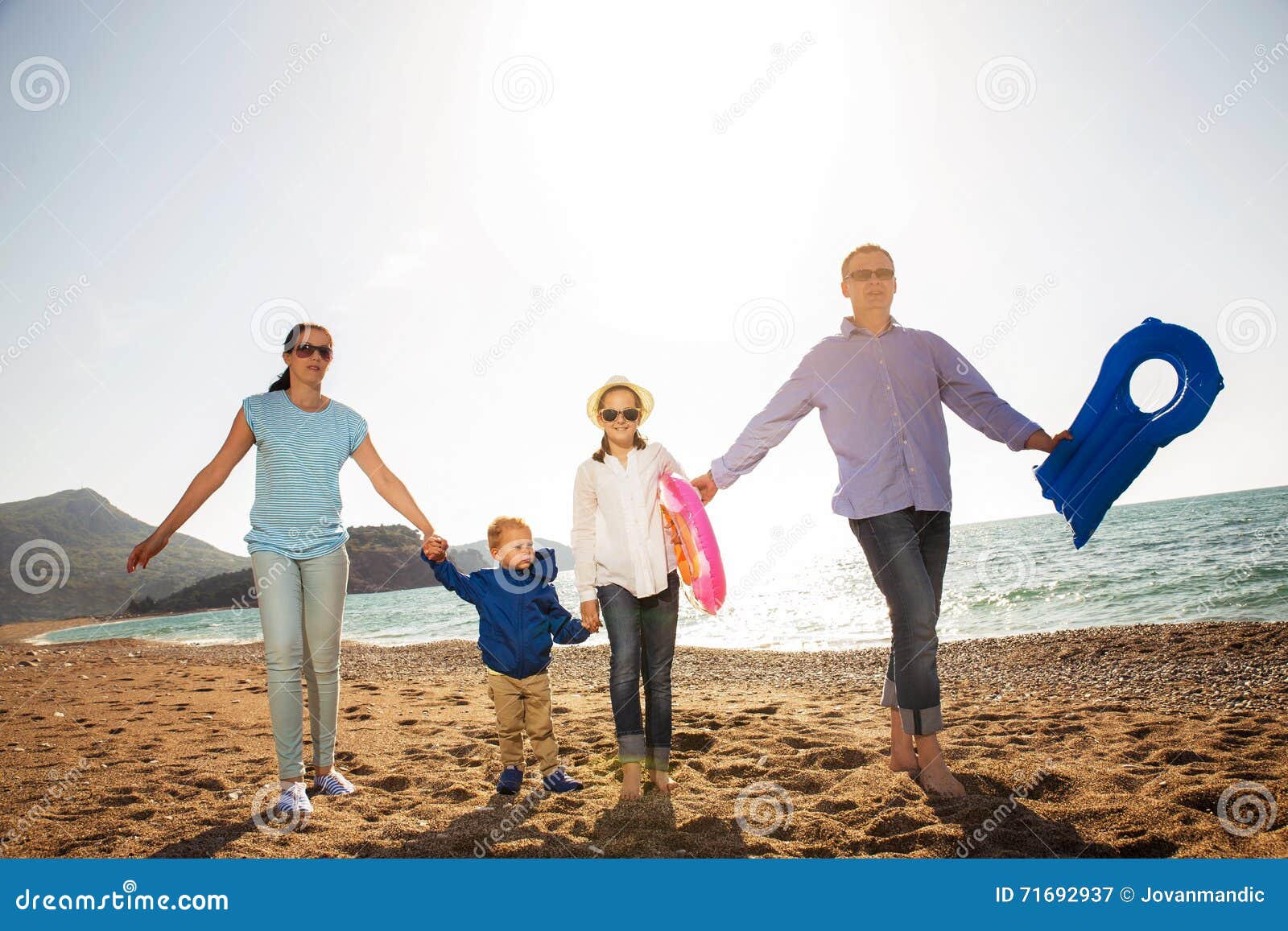 Family Having Fun Walking on Beach Stock Image - Image of happy, beach ...