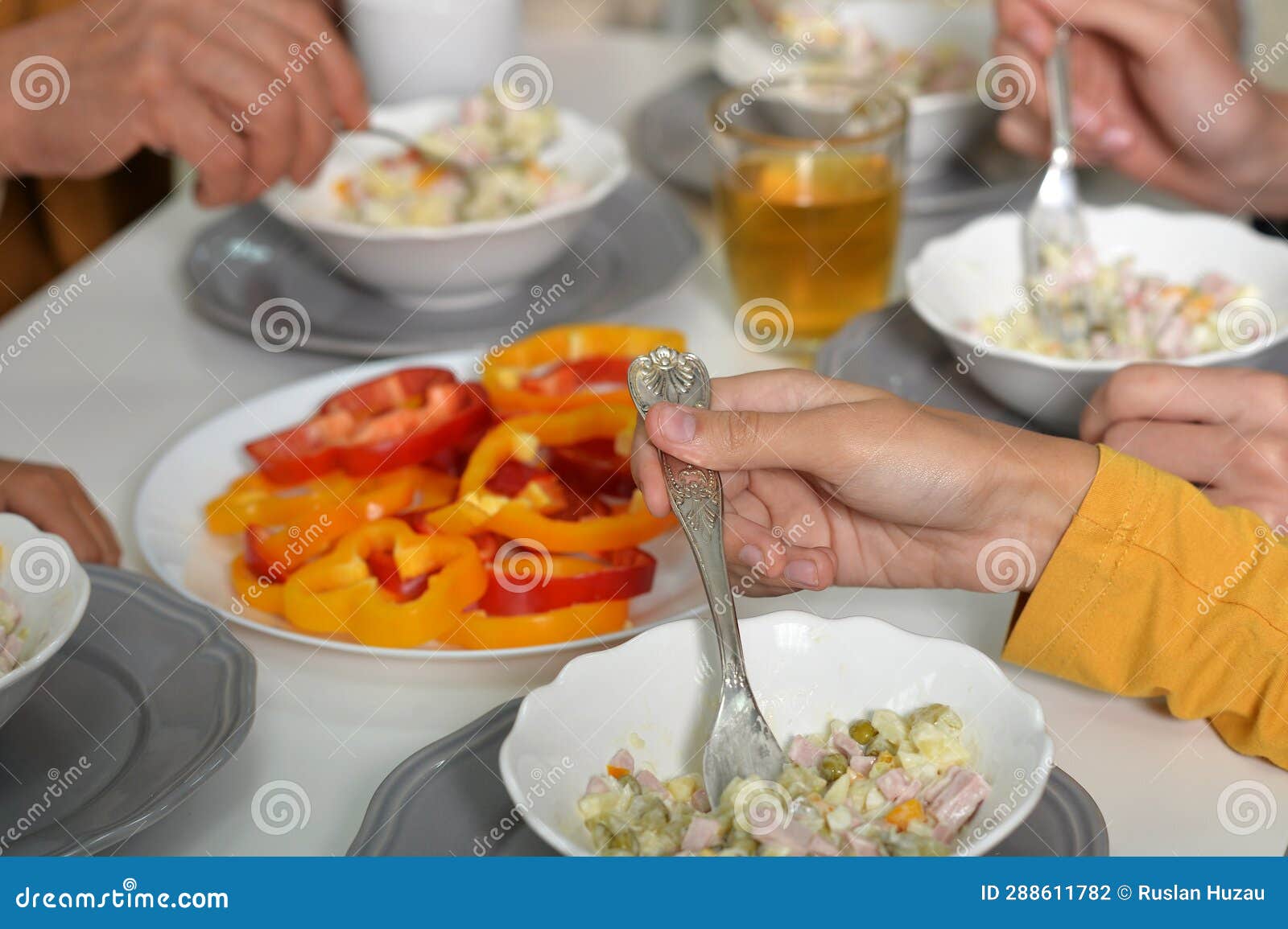 Family Having Lunch in Kitchen at the Table. Concept Stock Photo ...