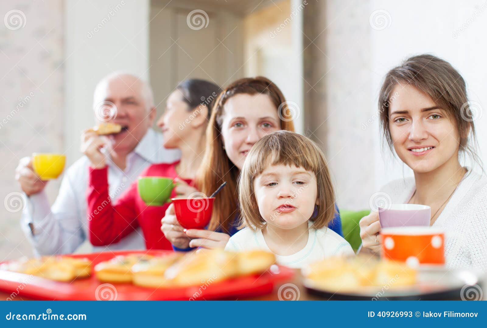 Family Having Tea with Cakes Stock Image - Image of family, drinks ...