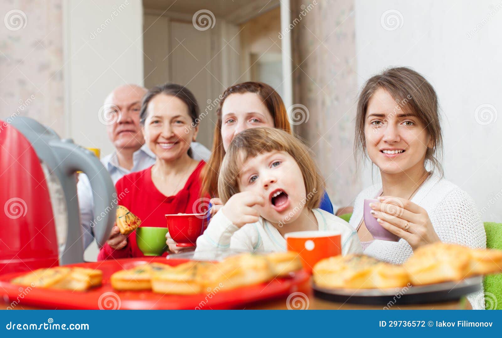 Family having tea at home stock photo. Image of children - 29736572
