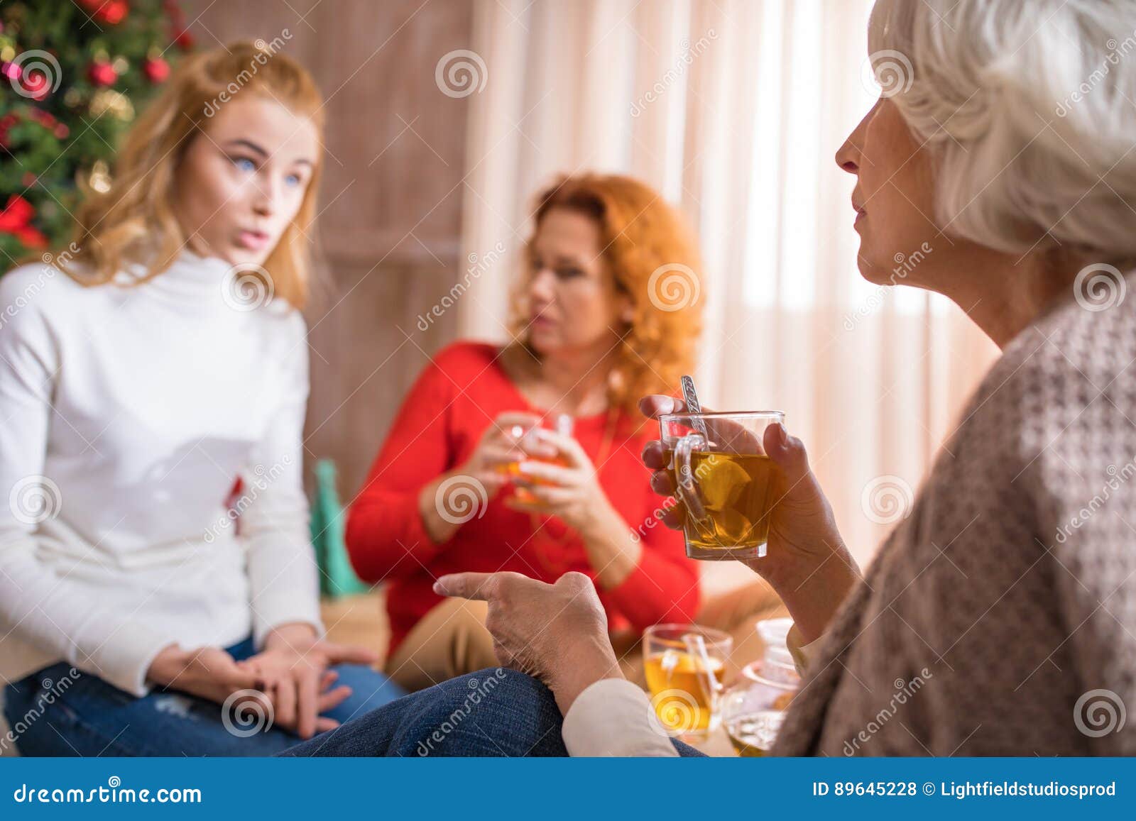Family having tea time stock photo. Image of closeness - 89645228
