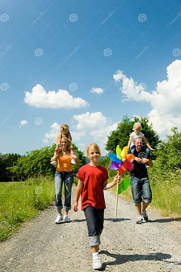 Family having a walk stock image. Image of girl, father - 5739443
