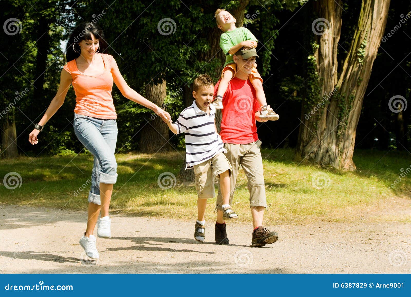 Family having a walk stock image. Image of promenade, playful - 6387829