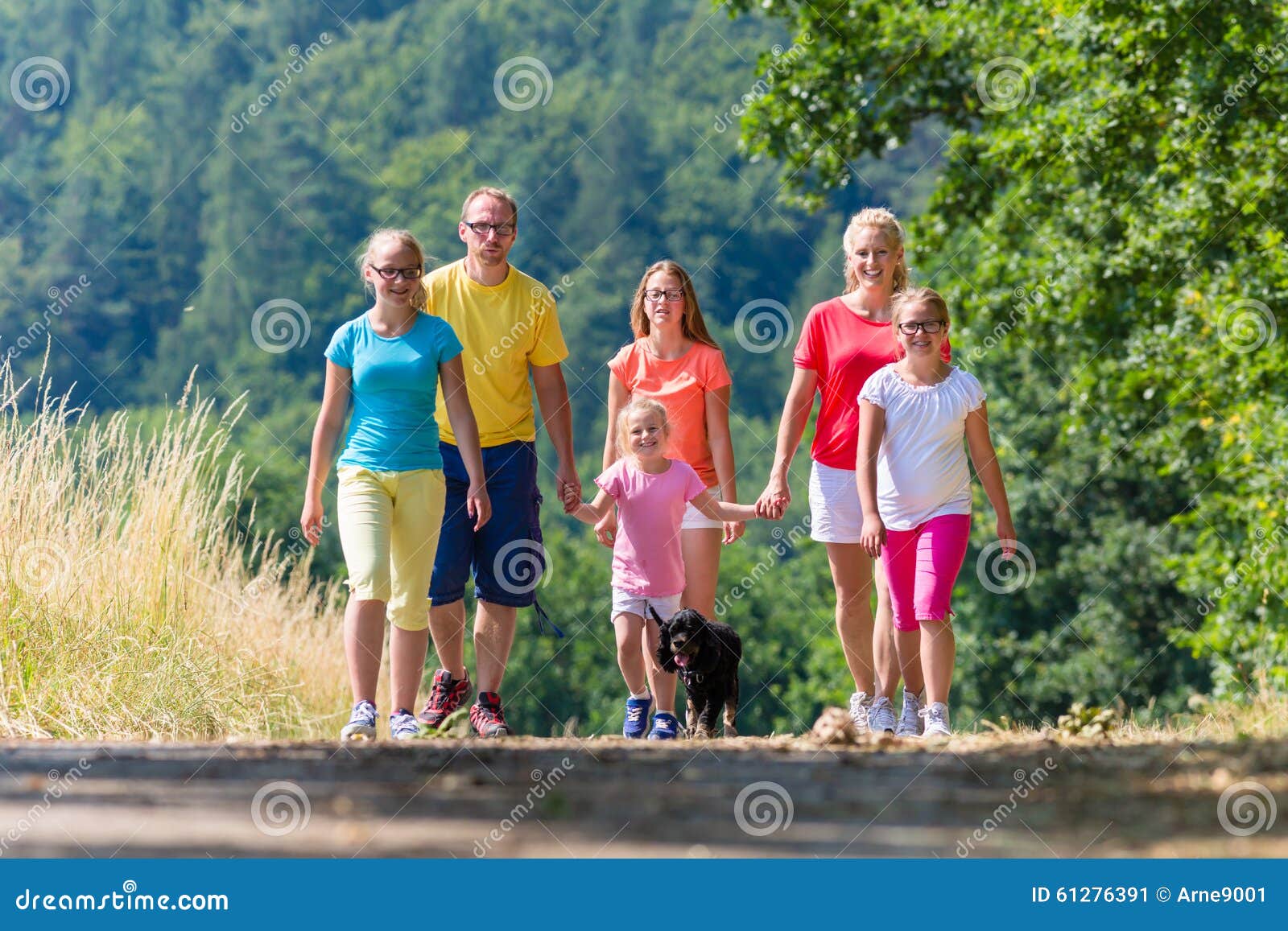 Family Having Walk on Path in the Woods Stock Image - Image of ...