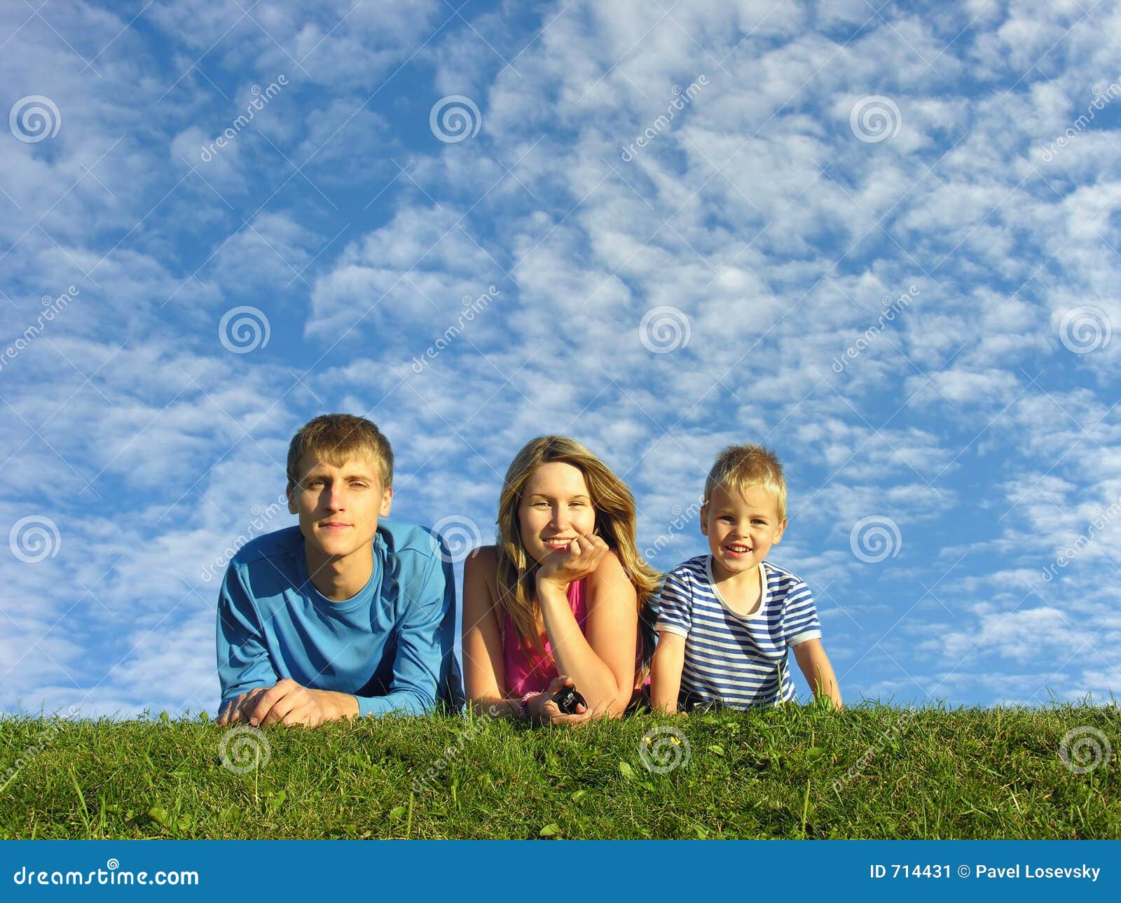 Family on Herb Under Blue Cloud Sky Stock Image - Image of joyful ...