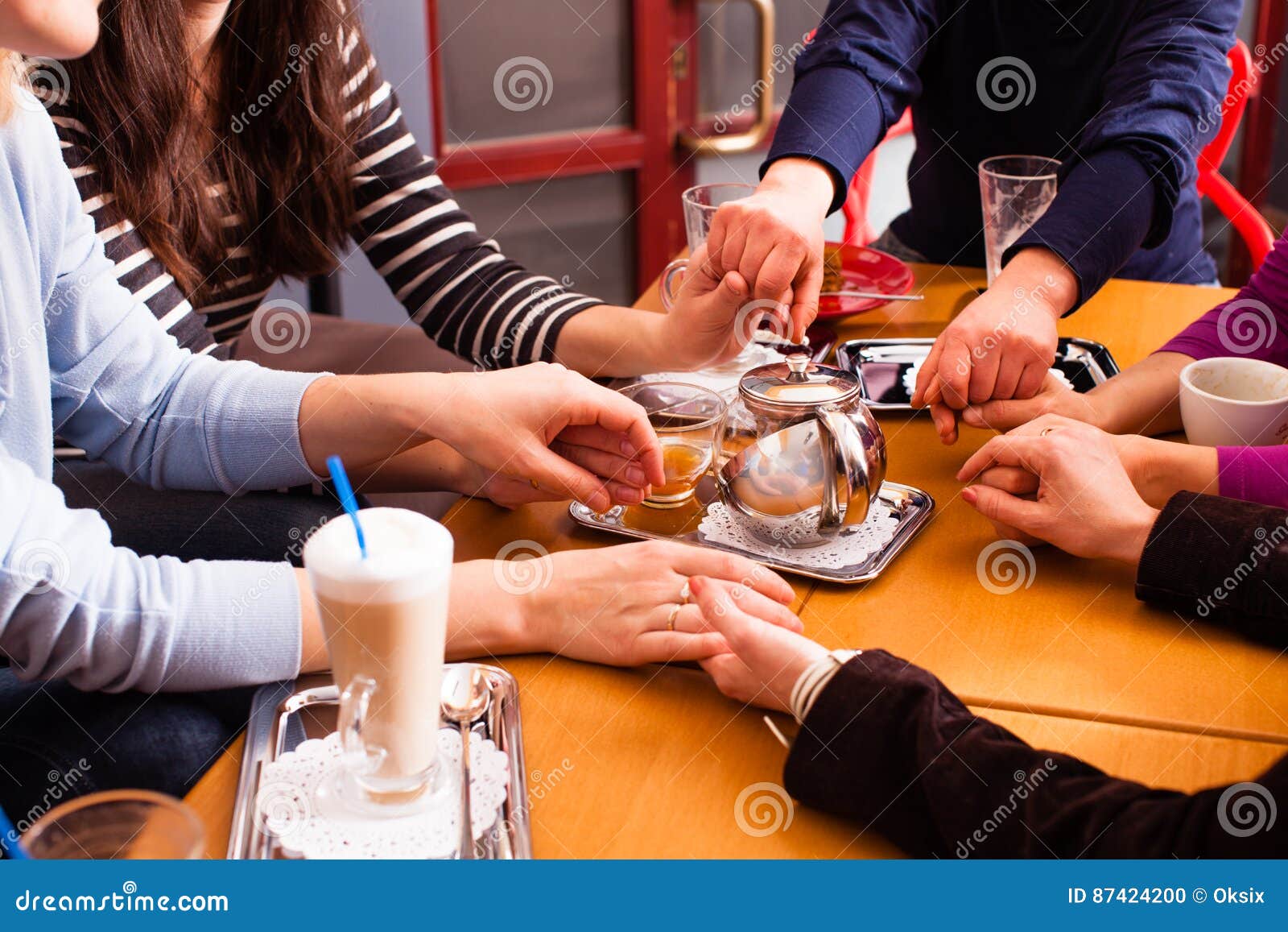 Family Holding Hands at the Table Stock Photo - Image of leisure ...