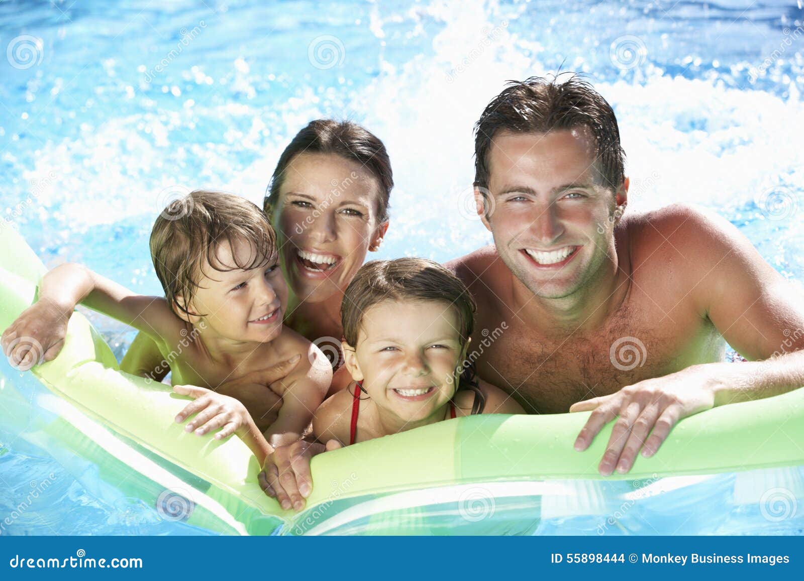 Family on Holiday in Swimming Pool Stock Photo - Image of parent ...