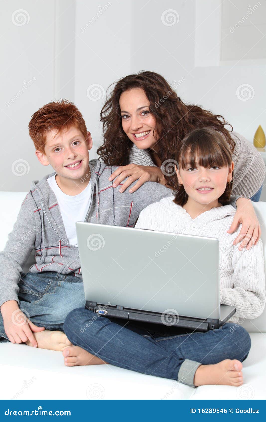 Family at Home with Laptop Computer Stock Photo - Image of young ...
