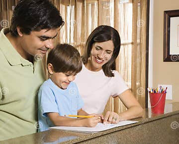 Family with homework. stock image. Image of learning, helpful - 4246425